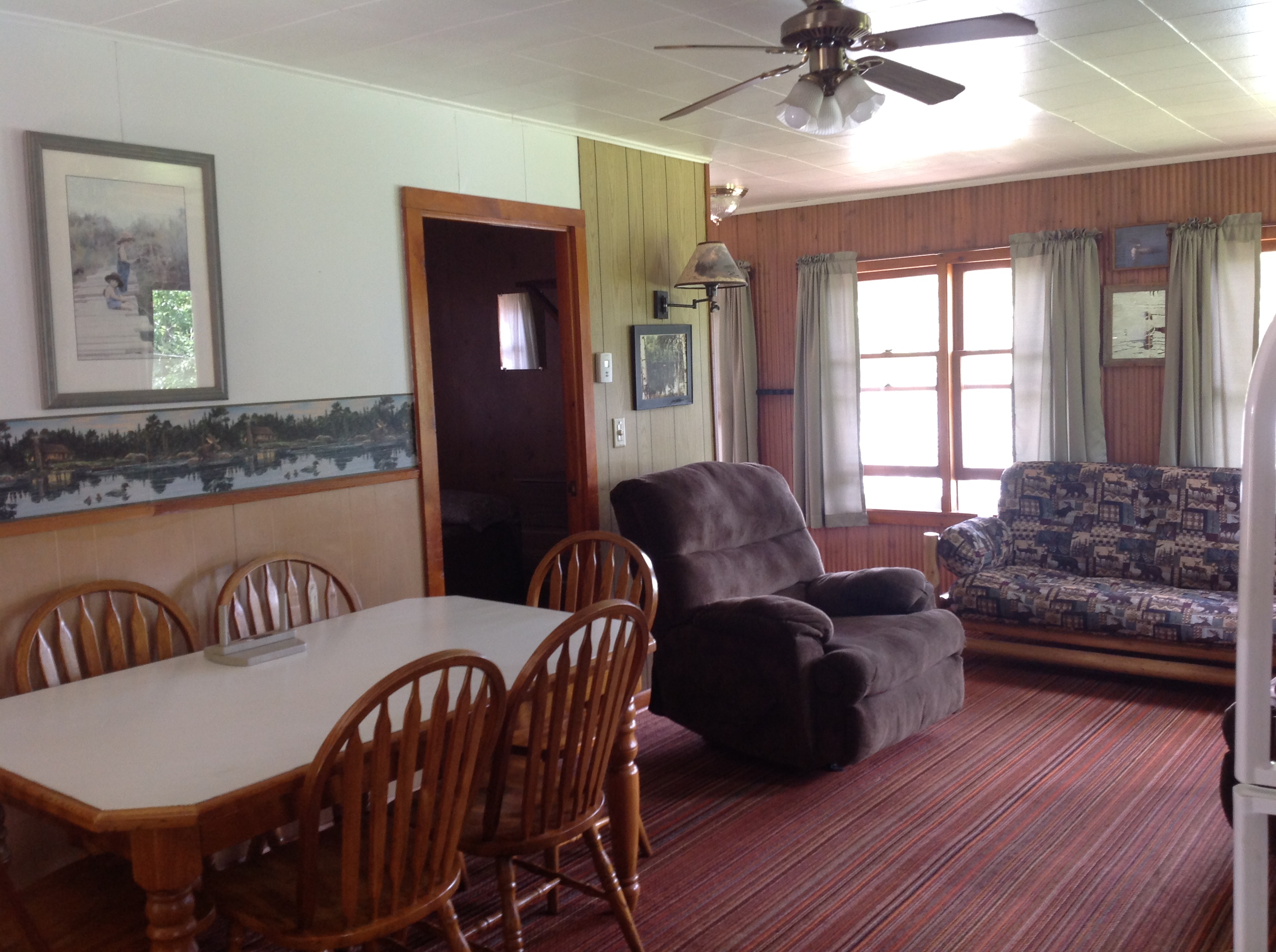 Living/dining area in Loon Lodge – Welcome to French Lake Resort